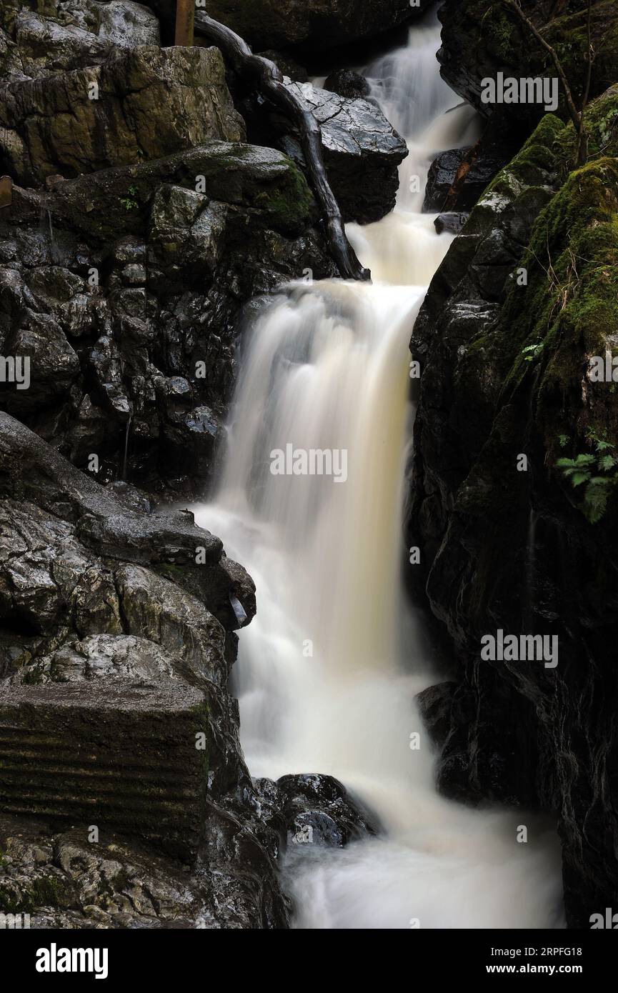 Cascade on the Afon Sychryd at the side of Craig y Ddinas. Total fall ...