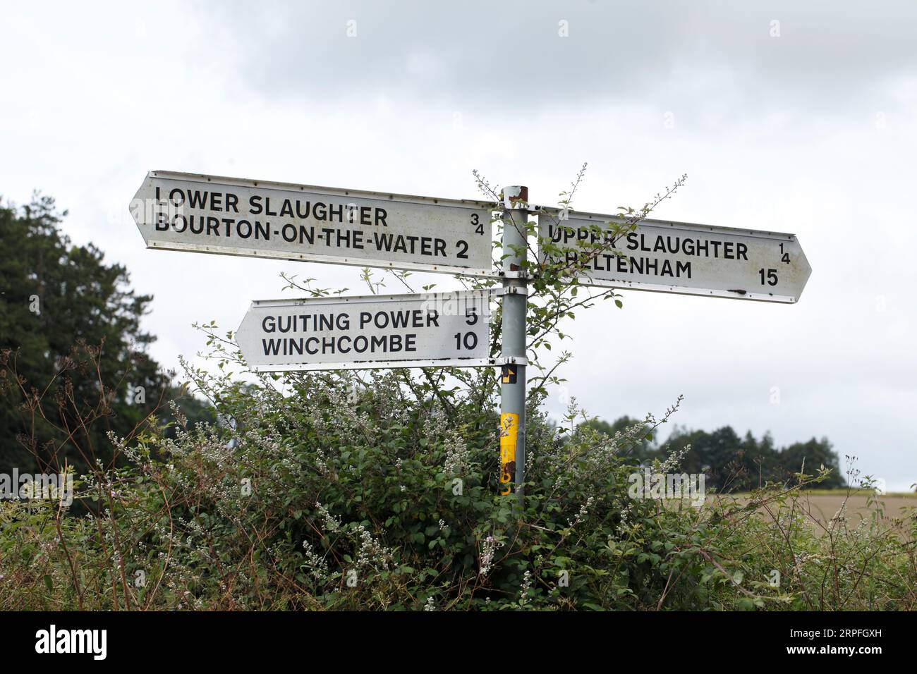 Street sign in the Cotswolds, showing Upper and Lower Slaughter ...