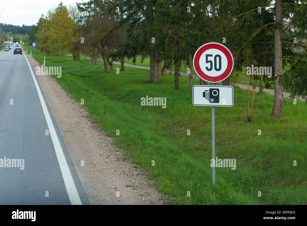 Road sign maximum speed limit 50, fixing speed by camera Stock Photo ...