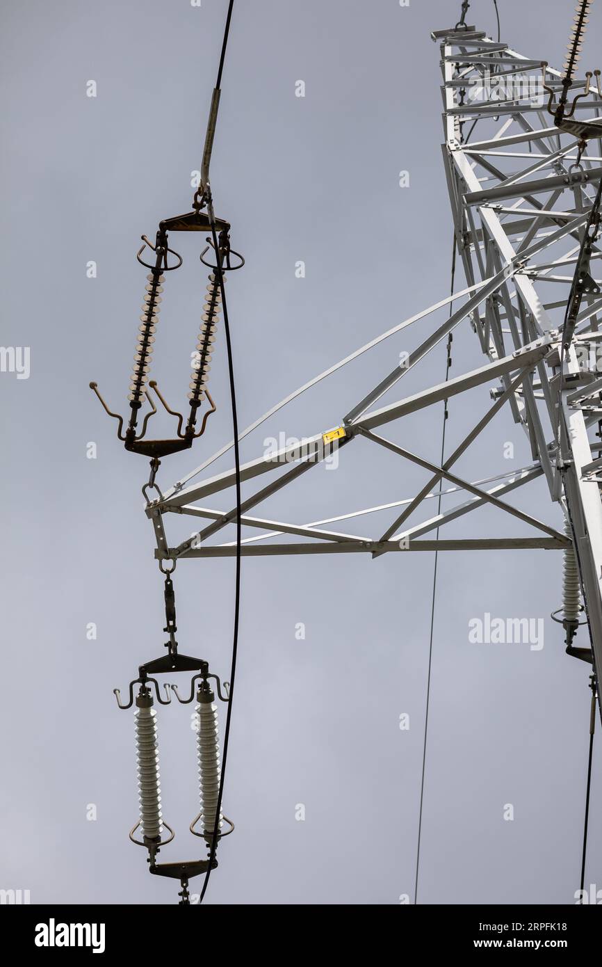 Bottom view of a section of a high-voltage overhead line pole Stock ...