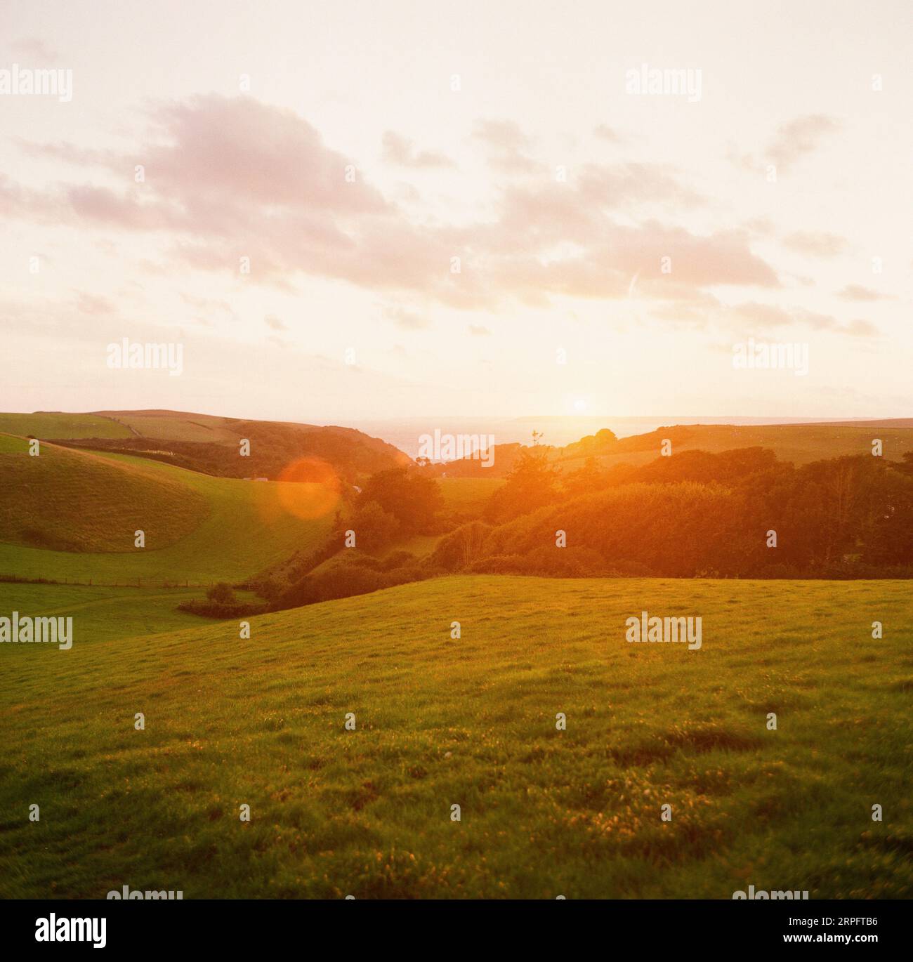 Sunset over Hope Cove, South Devon, England, United Kingdom Stock Photo ...