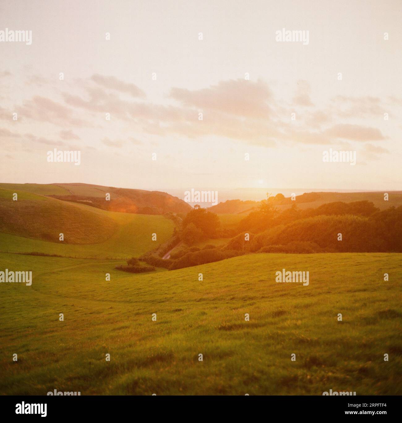 Sunset over Hope Cove, South Devon, England, United Kingdom Stock Photo ...