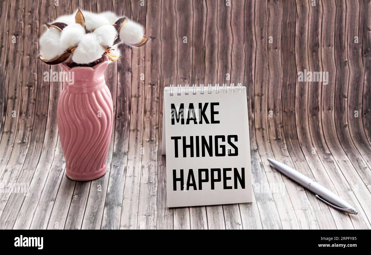 Motivational reminder Make things happen - handwriting on a notepad ...