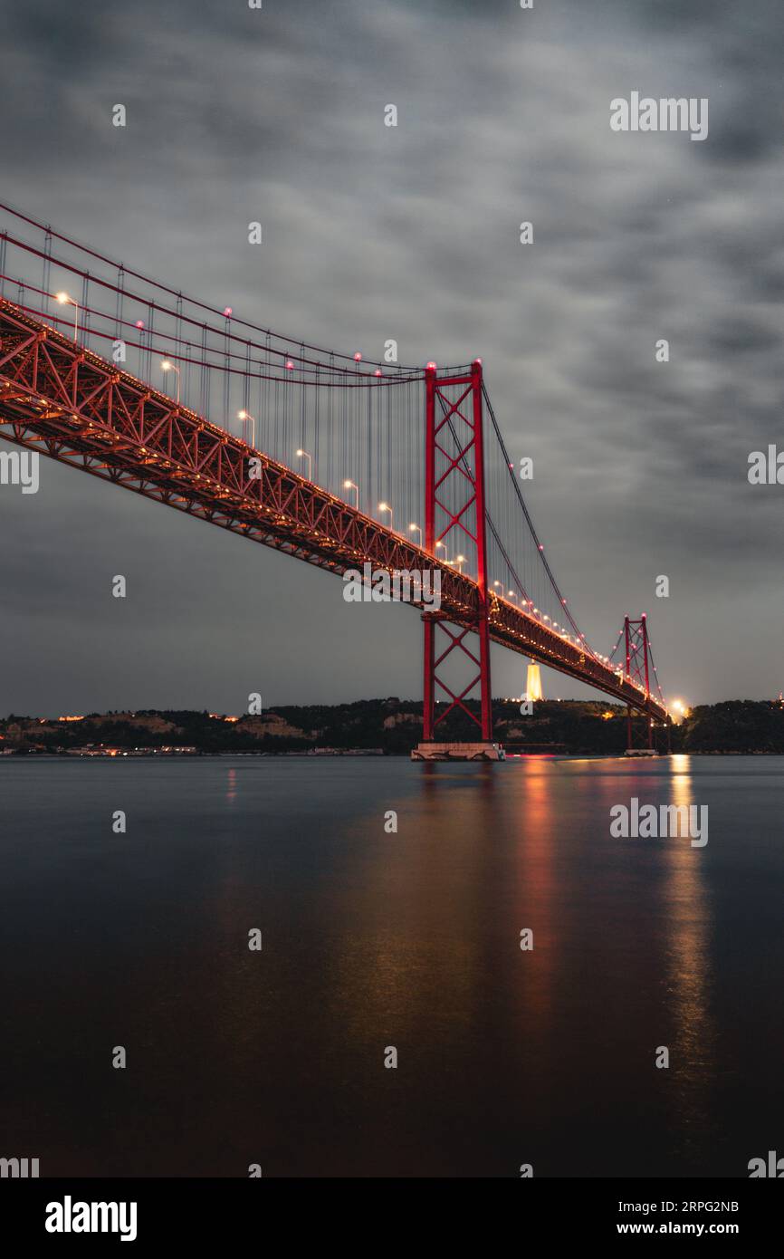 Vertical image of the 25 April bridge (Ponte 25 de Abril) located in ...