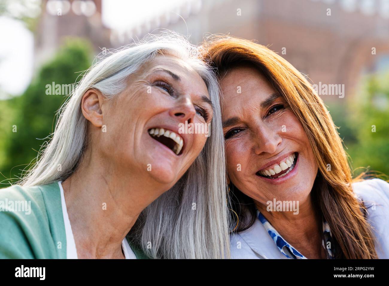Beautiful Senior Women Bonding Outdoors In The City Attractive