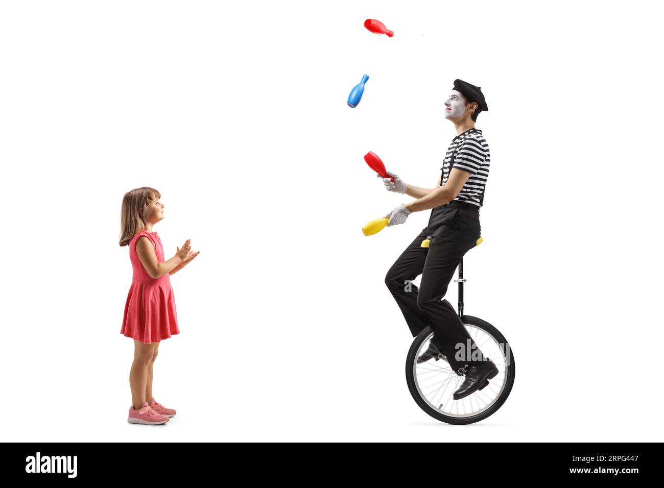 Full length profile shot of a girl clapping and looking at a mime ...