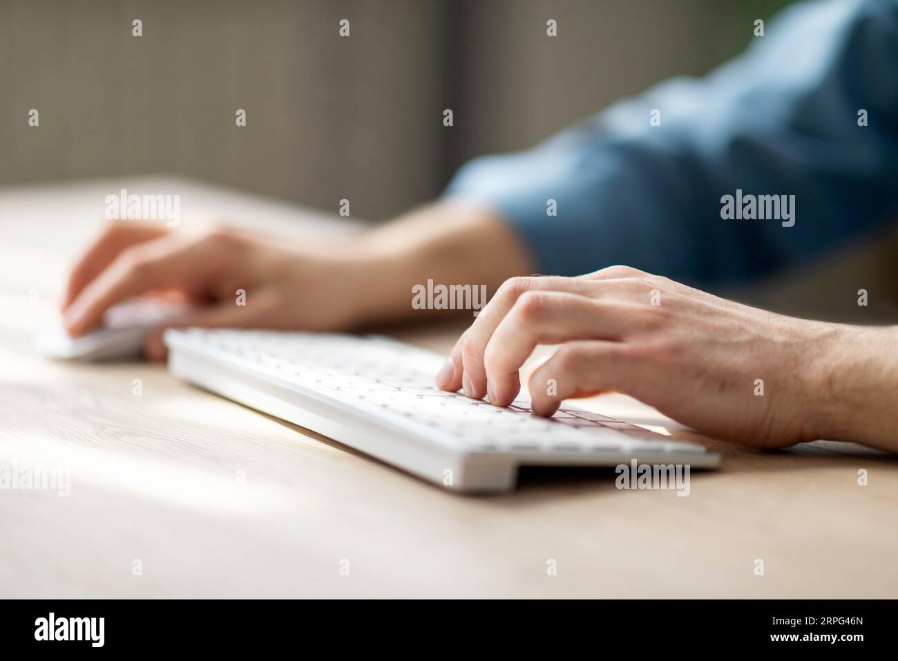 Unrecognizable Man Typing On Computer Keyboard And Using Wireless Mouse ...