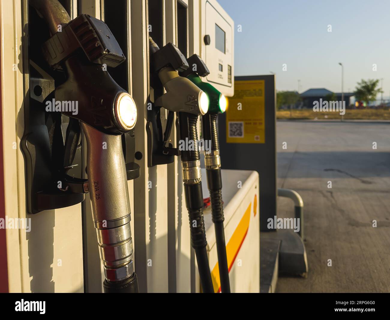 Man is refueling a car at a gas station hi-res stock photography and ...