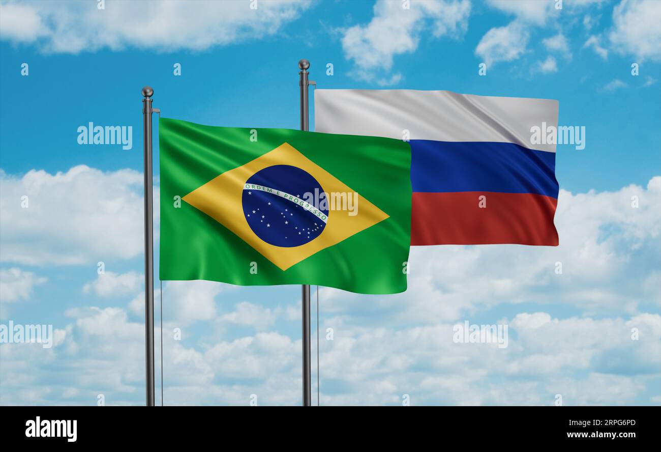 Russian Federation and Brazil flag waving together in the wind on blue ...