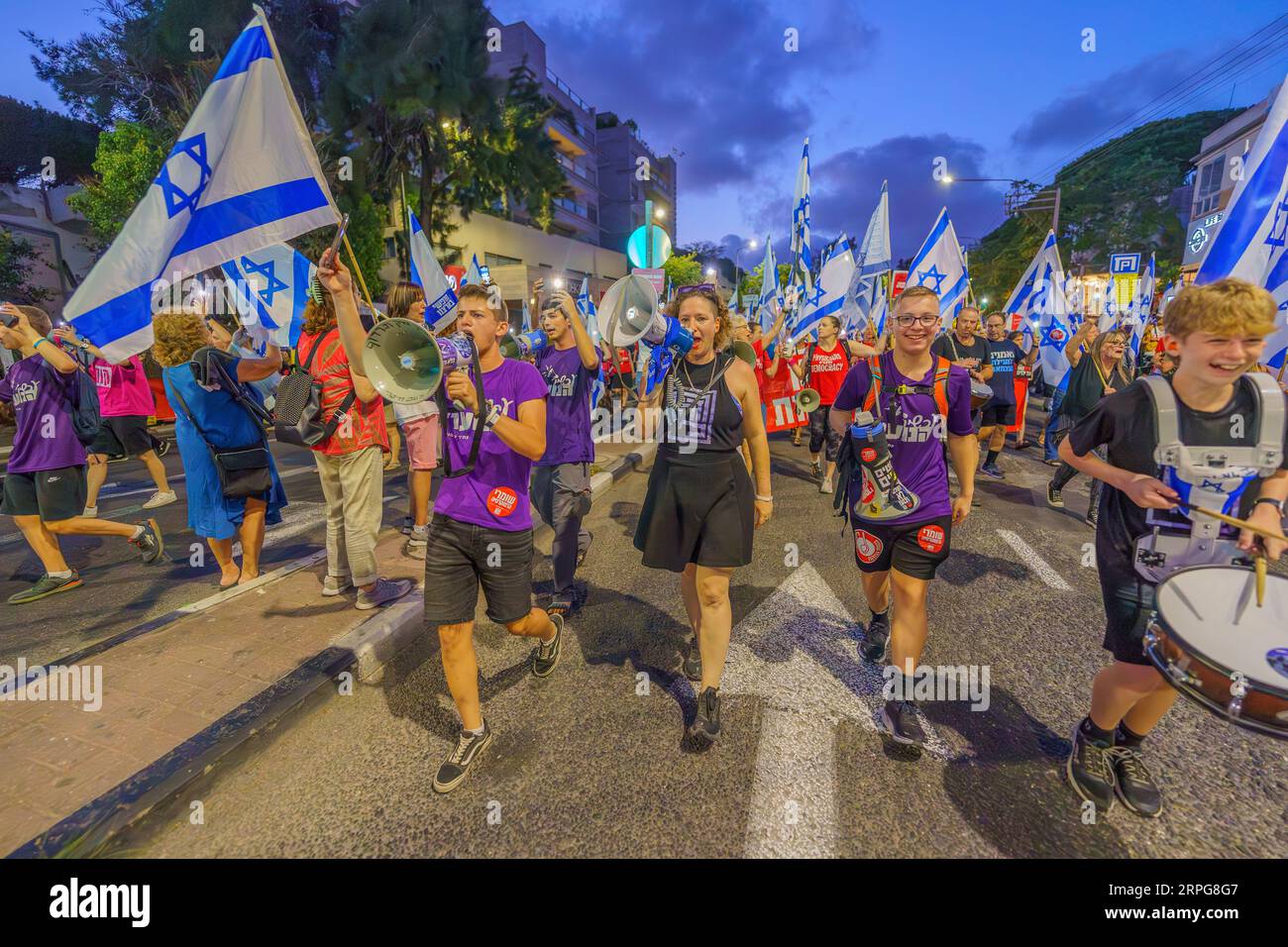 Haifa, Israel - September 02, 2023: People march with various signs and ...