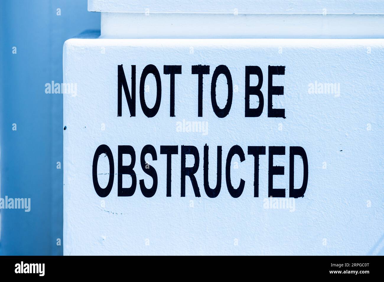 Not to be obstructed text on a hatch Stock Photo - Alamy