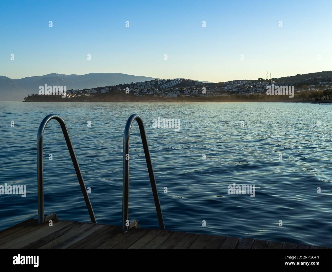 Handrail with steps at shore hi-res stock photography and images - Alamy