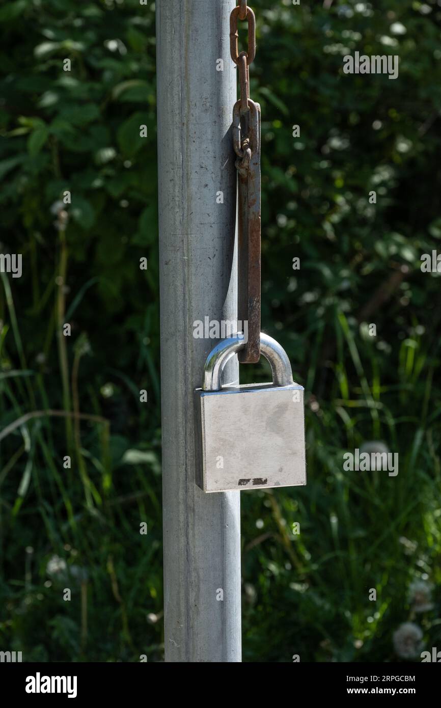 Chain hanging from pole hi-res stock photography and images - Alamy