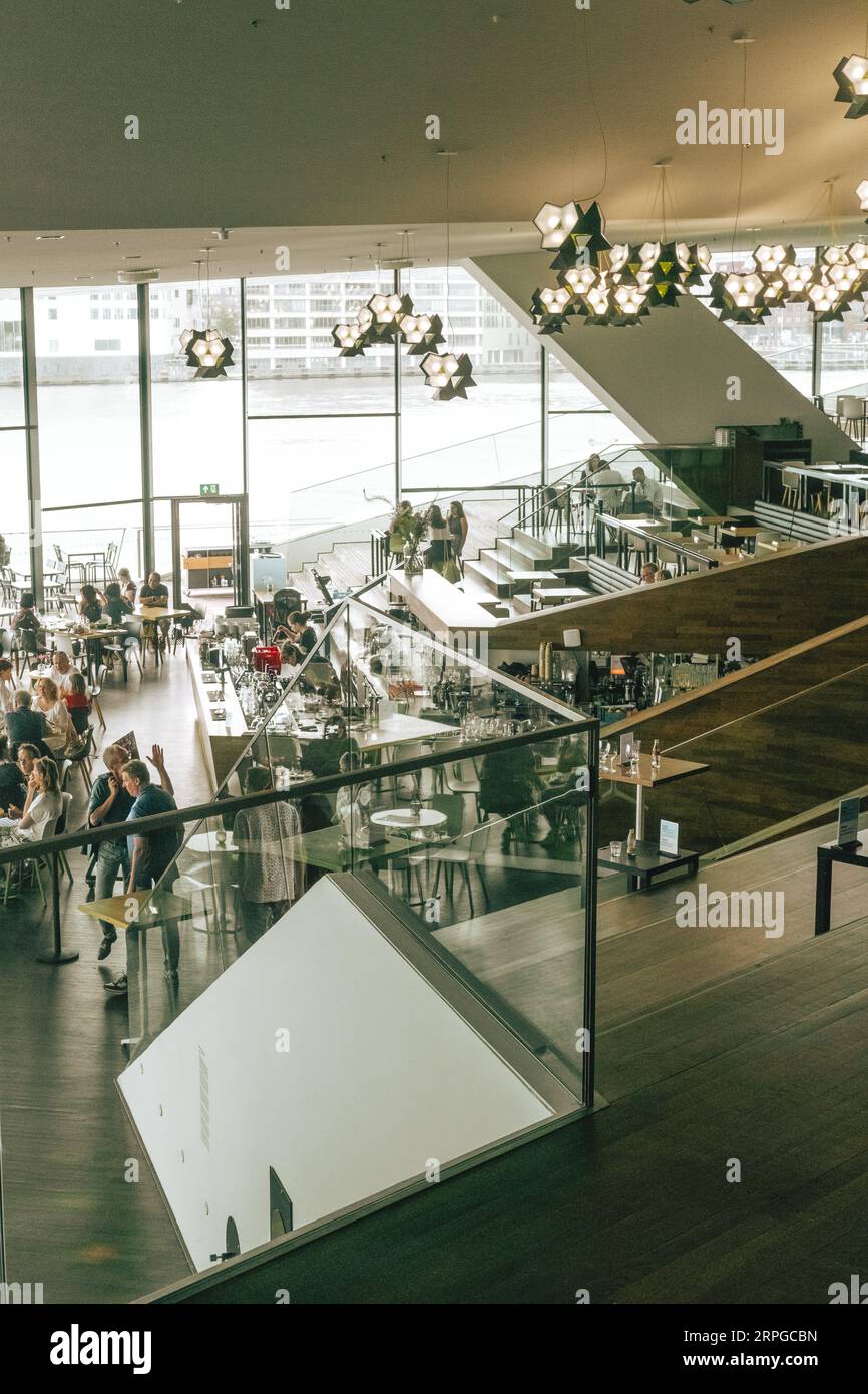 Interior view of the Eye Bar Restaurant full with customers and large ...