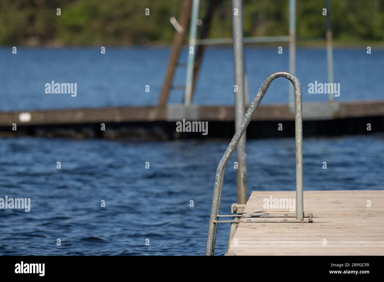 Hand railings at a bathing pier Stock Photo - Alamy