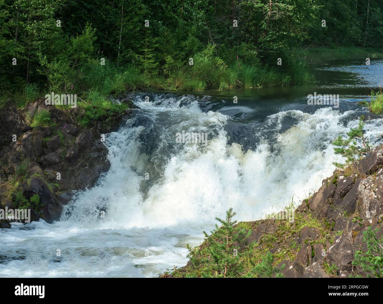 natural landscape with a small waterfall with clear water Stock Photo ...