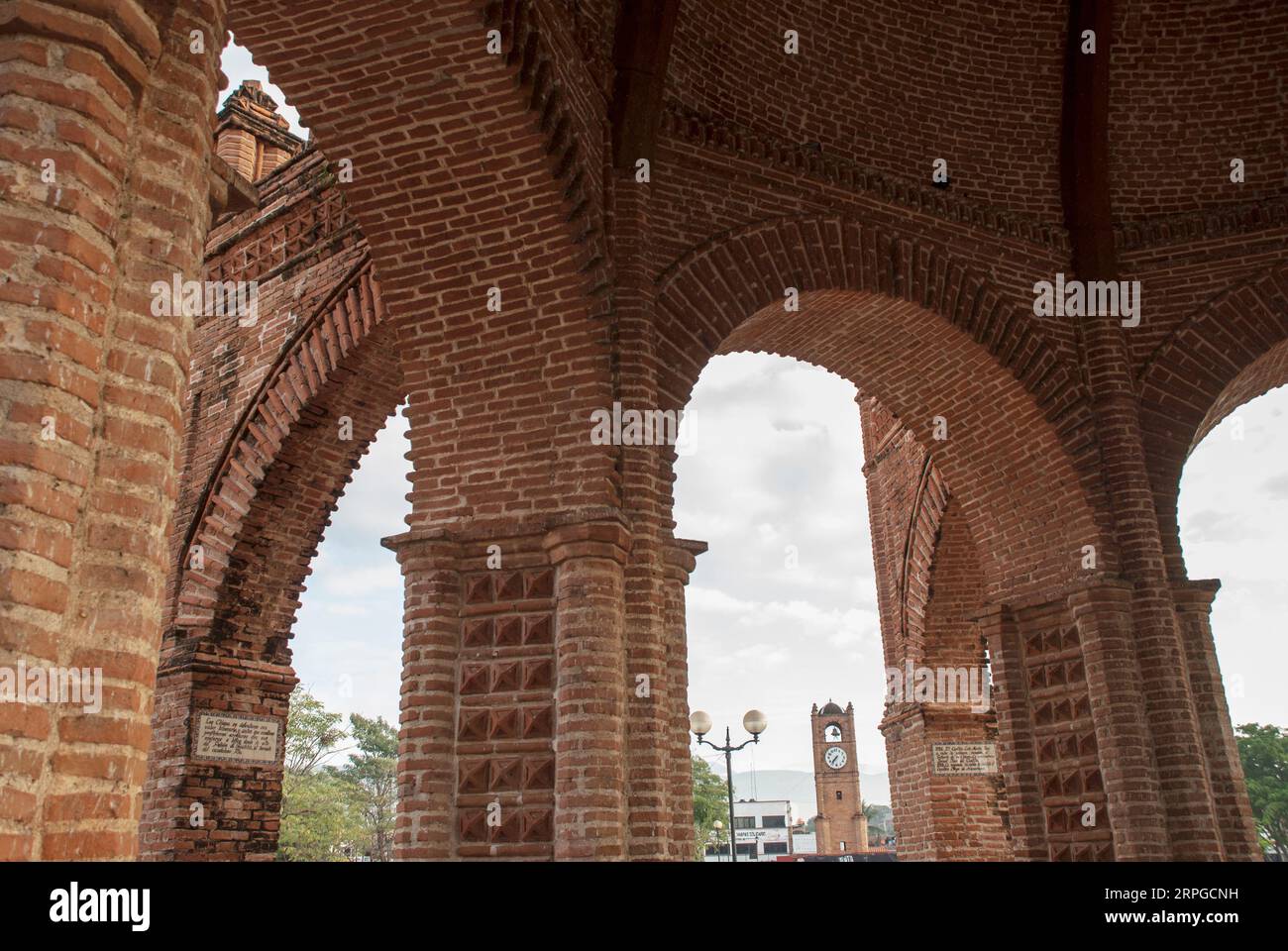 Picture of the interior of a red brick-made structure. An appreciation ...