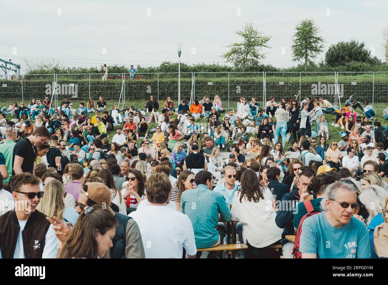 Large crowd of people sitting hi-res stock photography and images - Alamy
