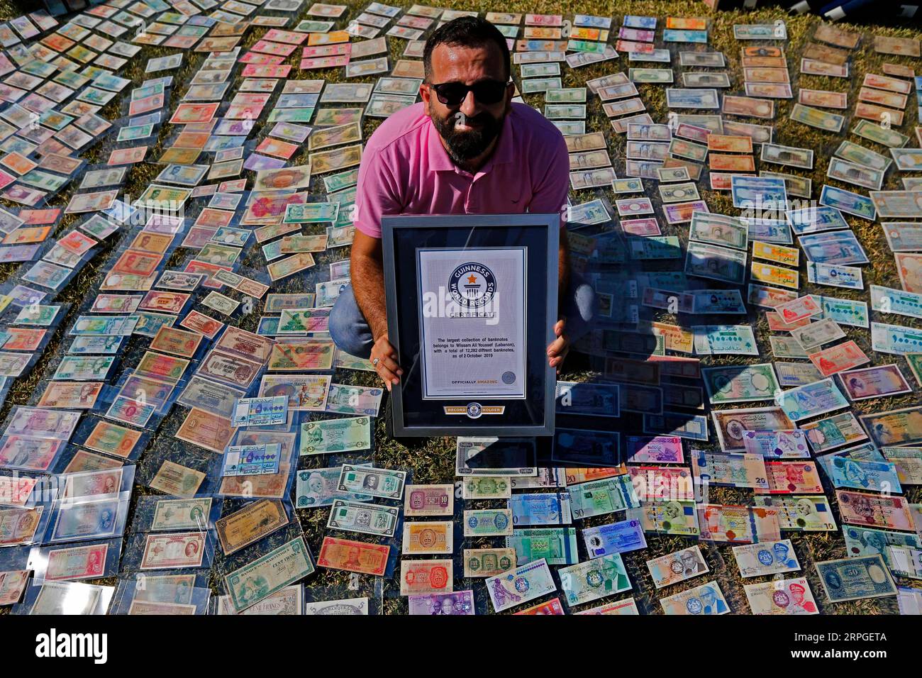 191014 -- BEIJING, Oct. 14, 2019 -- Wissam Ali Youssef shows his ...
