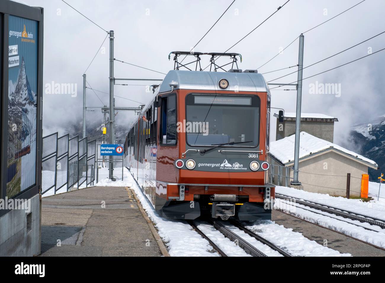 The Gornergrat Bahn cogwheel train arriving at the Gornergrat Station ...