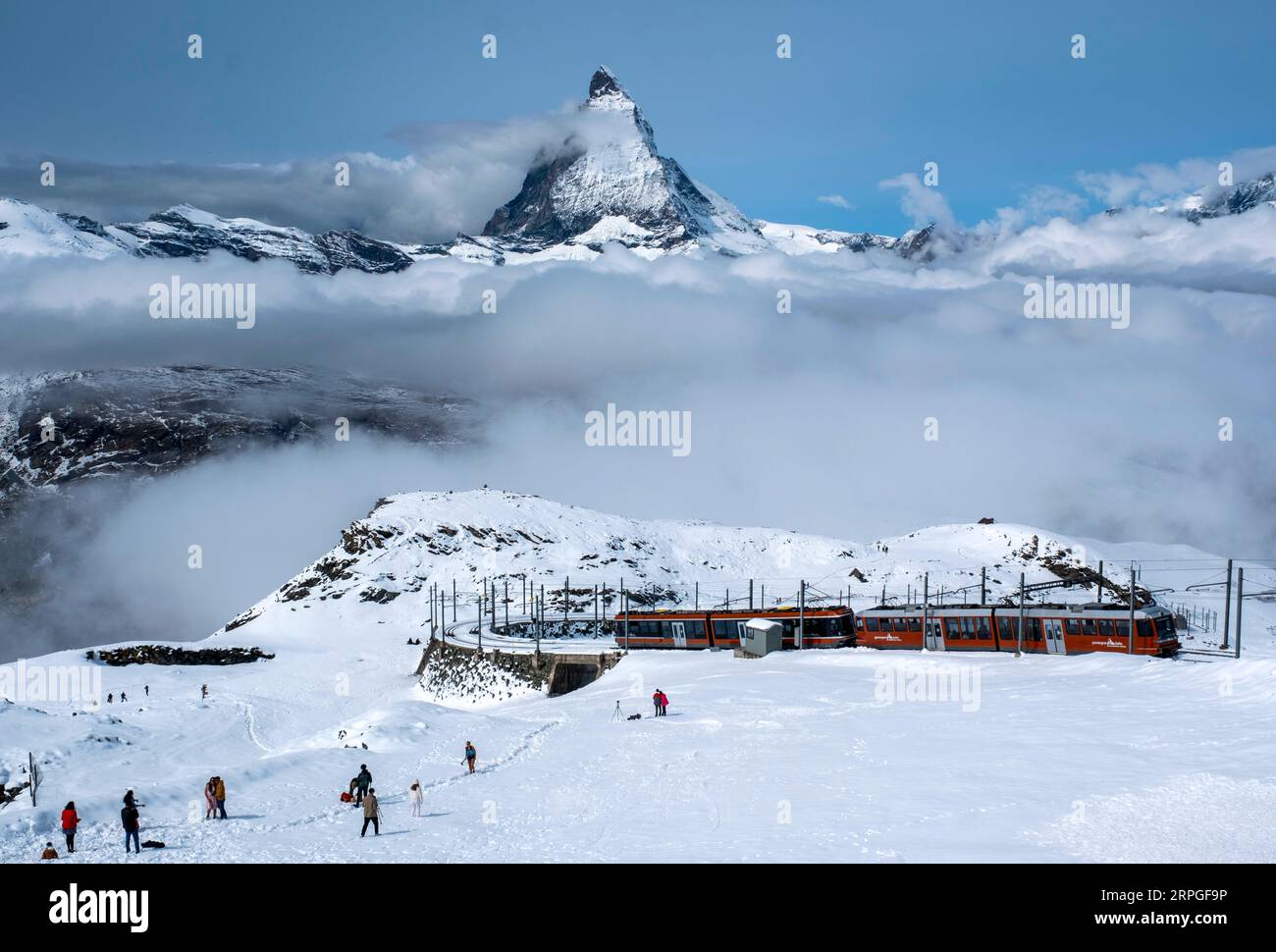 The Gornergrat Bahn cogwheel train arriving at the Gornergrat Station ...
