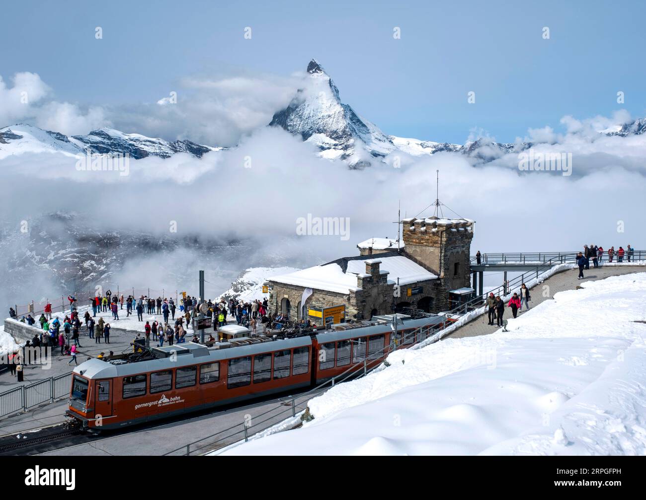 The Gornergrat Bahn cogwheel train arriving at the Gornergrat Station ...