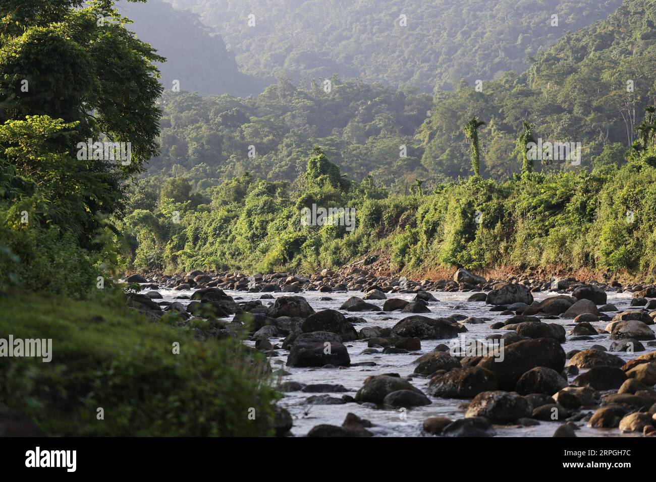 water flow through mountain river in Bangladesh Stock Photo - Alamy