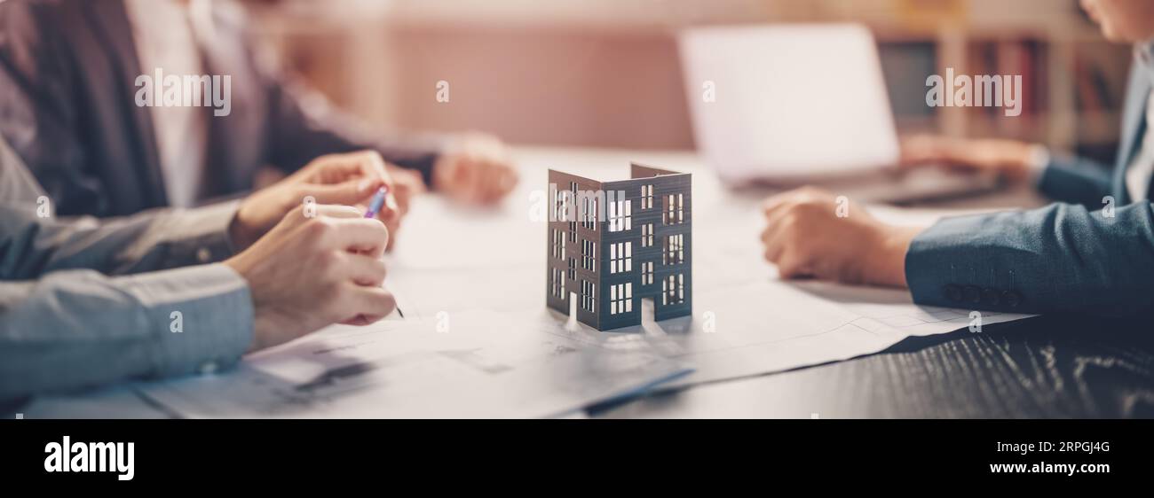 Architect client discussing plan blueprint hi-res stock photography and ...