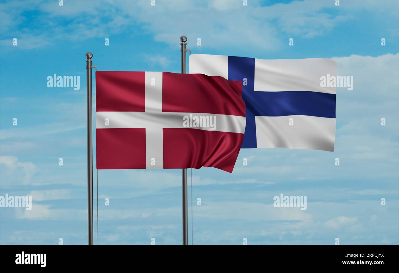 Finland flag and Denmark flag waving together on blue sky, two country ...