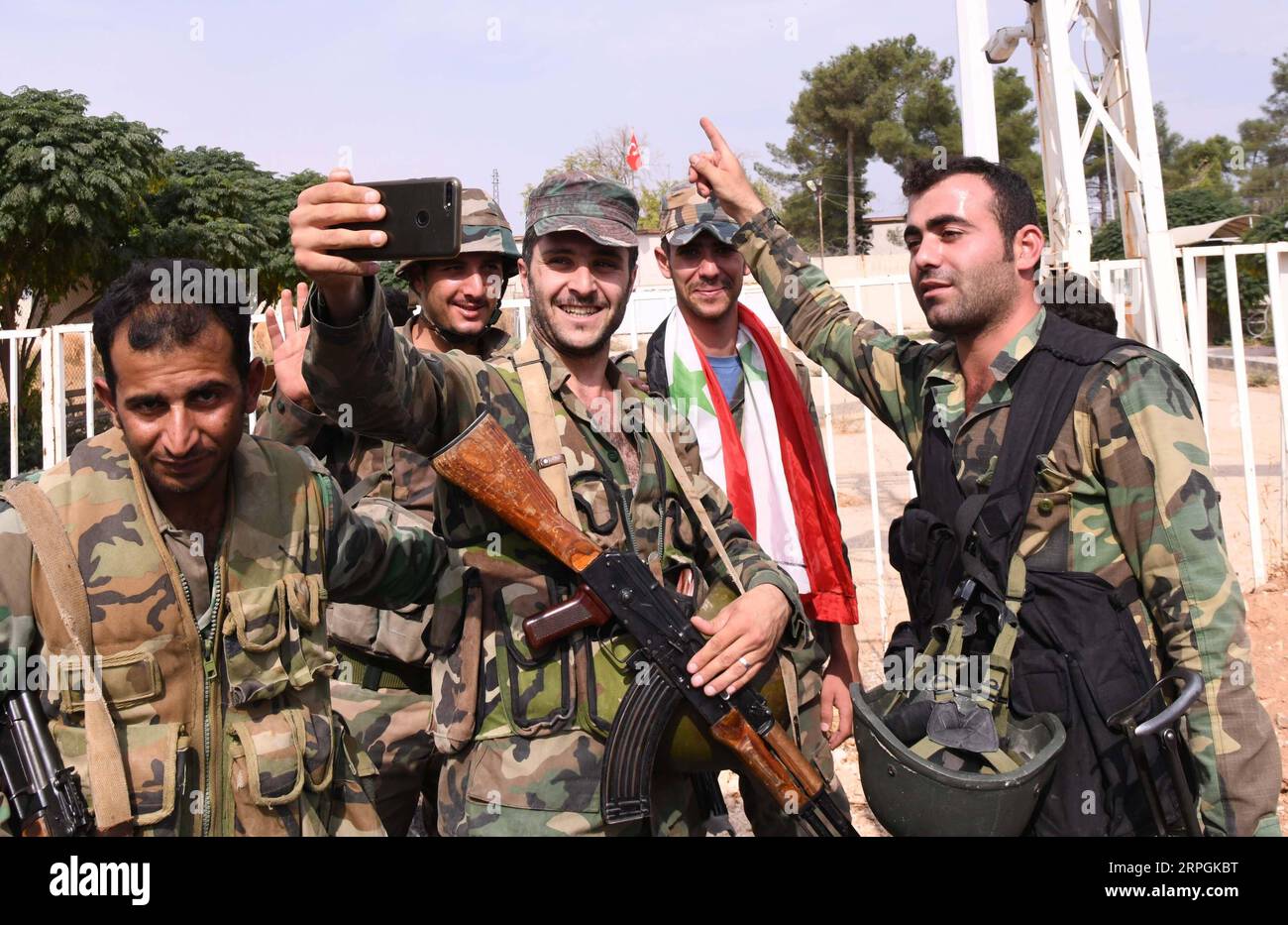 191018 -- ALEPPO, Oct. 18, 2019 -- Syrian soldiers are seen celebrating ...