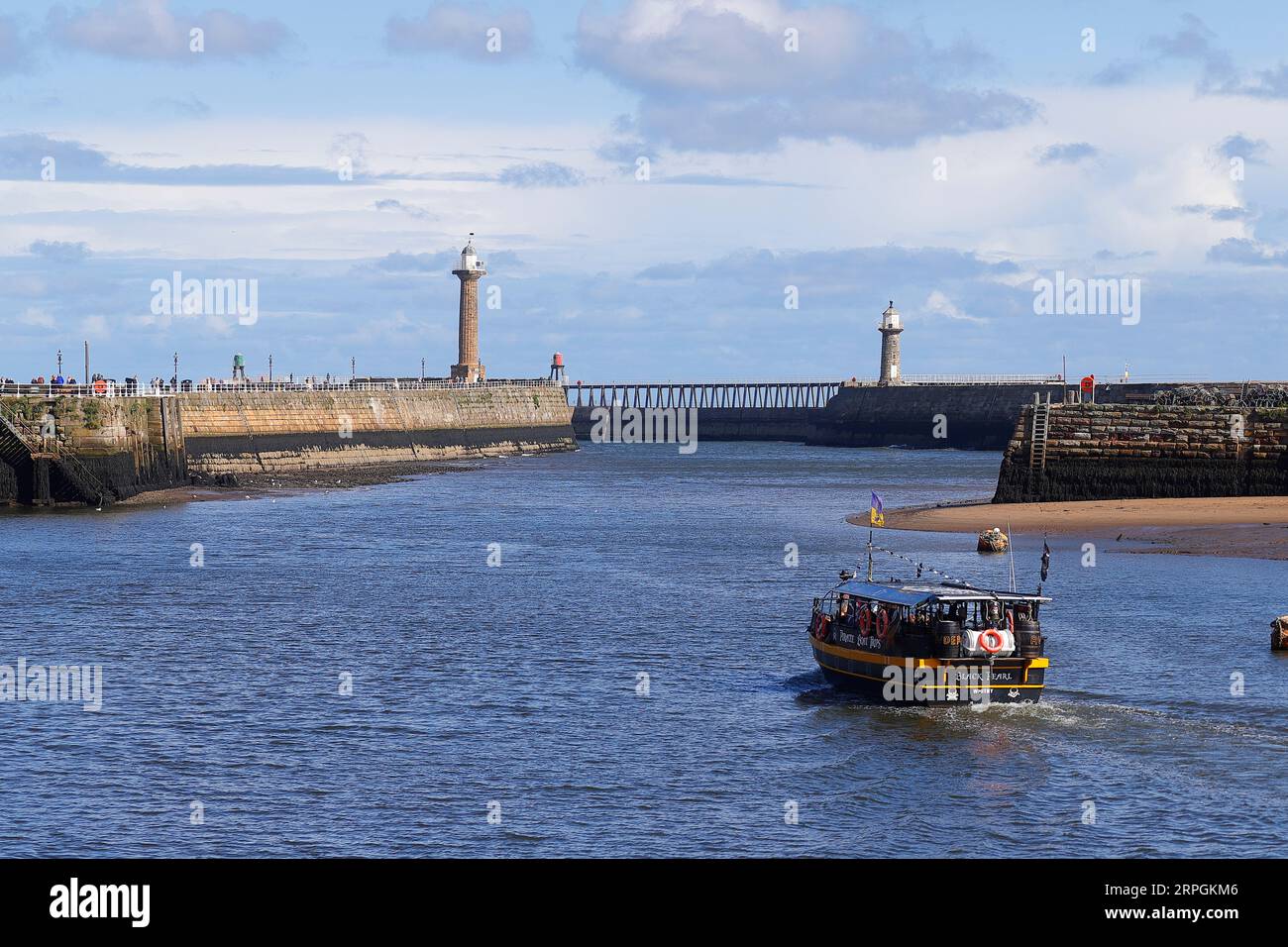 A Pirate Boat trip heads out of the harbour in Whitby,North Yorkshire ...