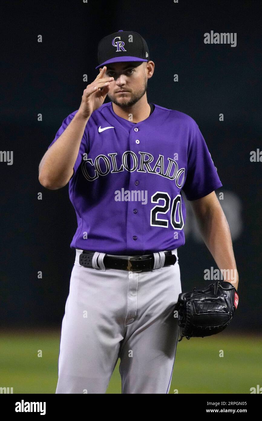 Colorado Rockies pitcher Peter Lambert salutes the Arizona Diamondbacks ...