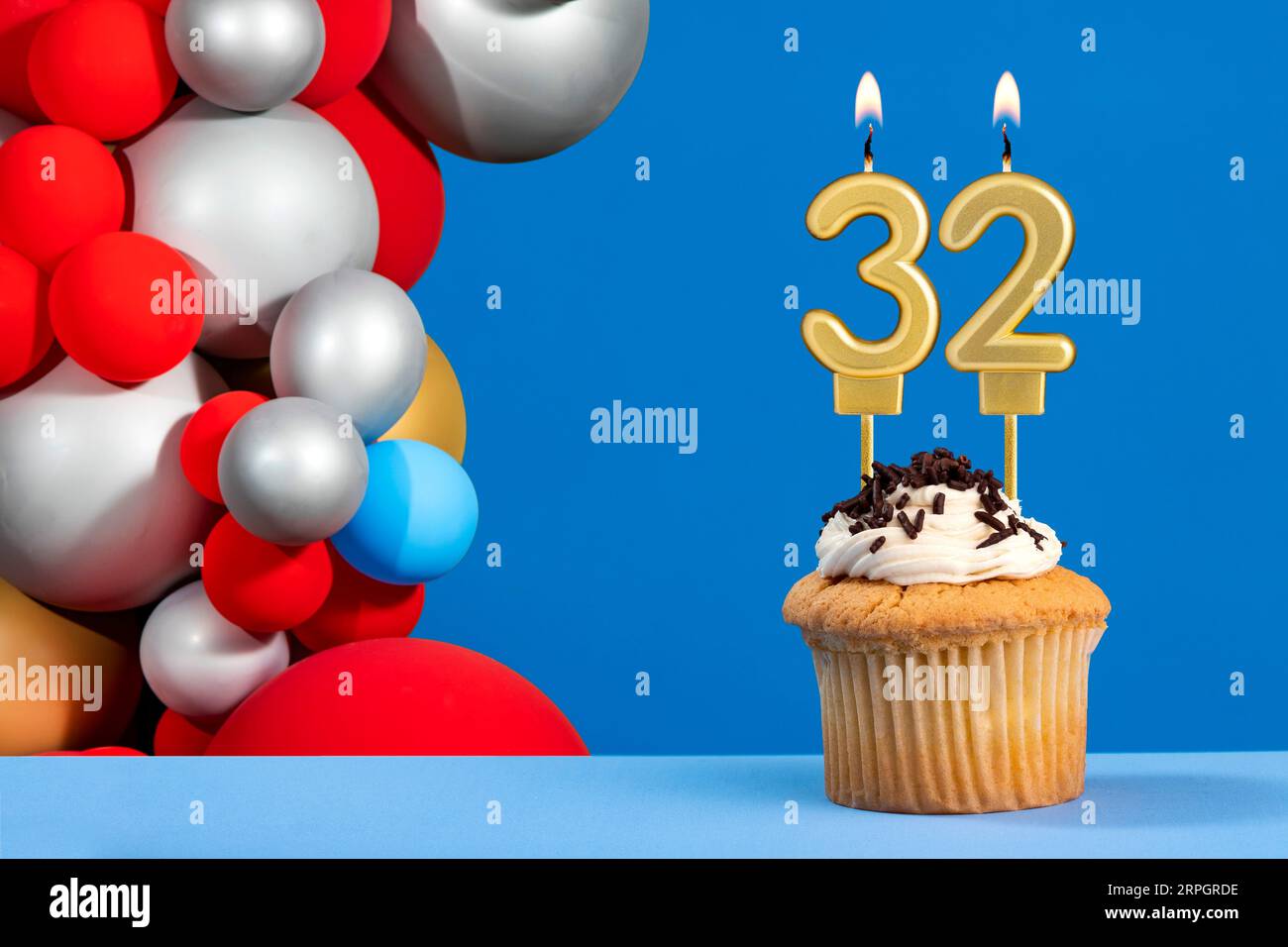 Birthday card with balloons - Candle number 32 Stock Photo - Alamy