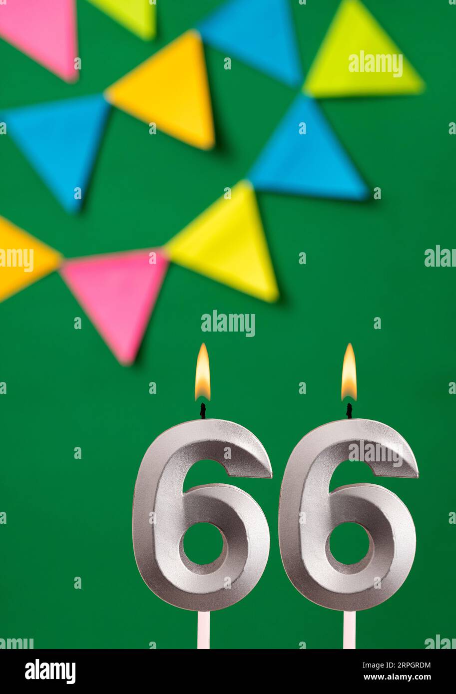 Vertical birthday card with number 66 candle - Green background with ...
