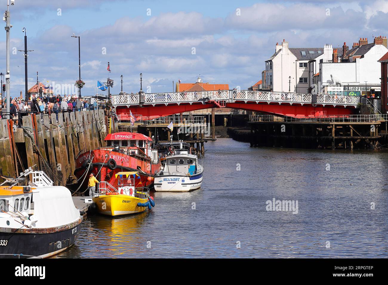 A view of the swing bridge on the River Esk in Whitby Harbour, North ...