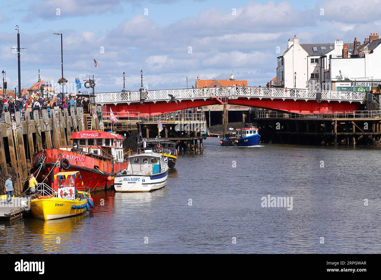 A view of the swing bridge on the River Esk in Whitby Harbour, North ...