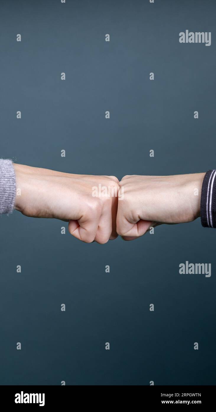 Knuckles together hi-res stock photography and images - Alamy
