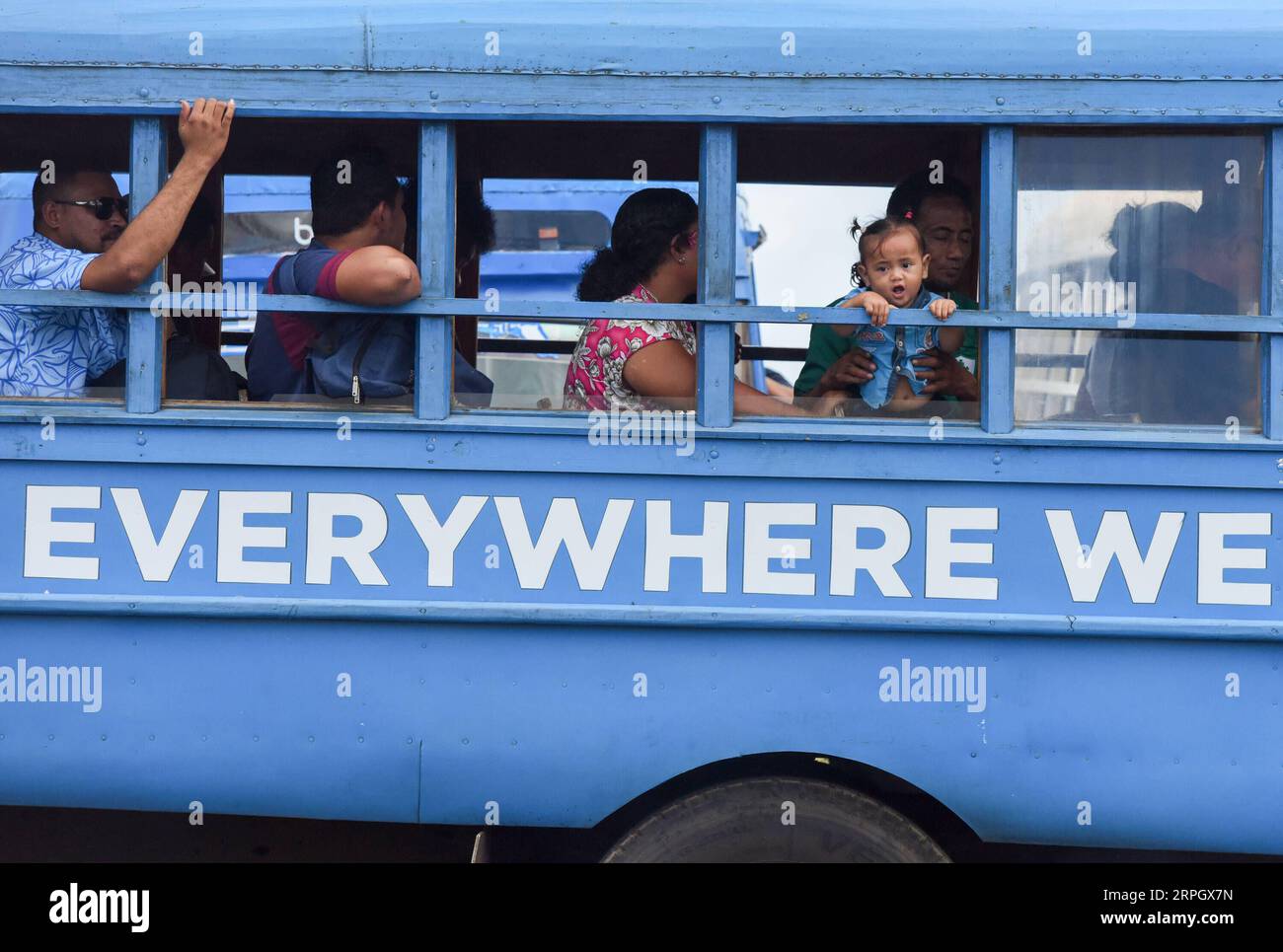 191023 -- APIA, Oct. 23, 2019 -- Passengers take a public bus in Apia ...