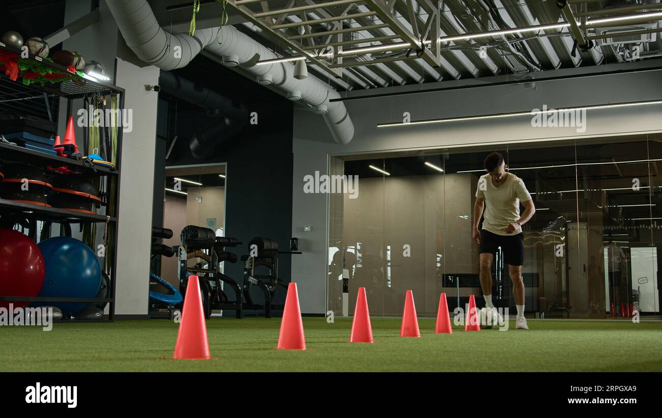 Caucasian man professional footballer soccer player running hitting ...