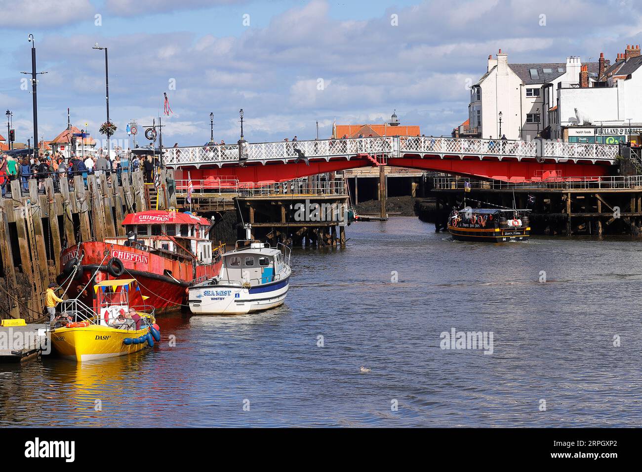 A view of the swing bridge on the River Esk in Whitby Harbour, North ...