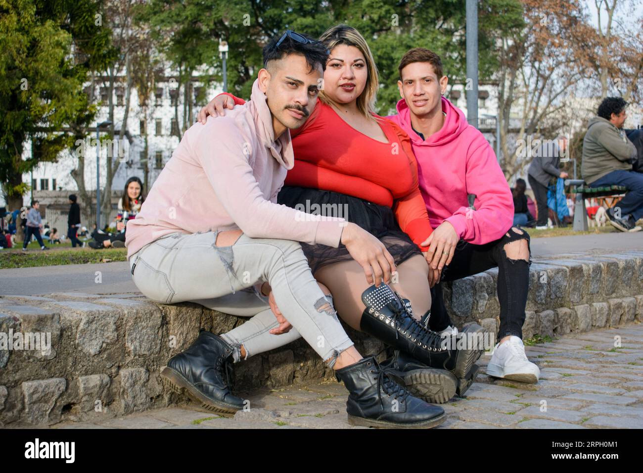 three friends two men from lgbt community and young woman of pus size ...