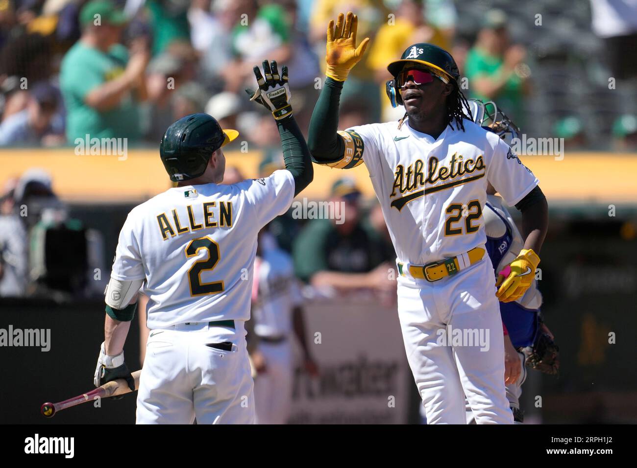 Oakland Athletics' Lawrence Butler (22) is congratulated by Nick Allen ...