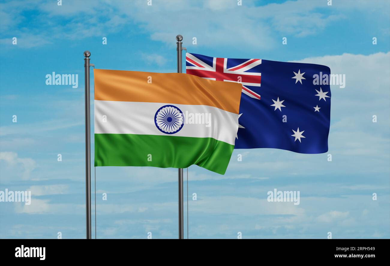 Australia flag and India flag waving together on blue sky, two country ...