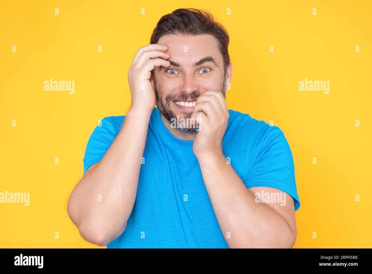 Emotional scared man looks with frightened expression, nervously ...