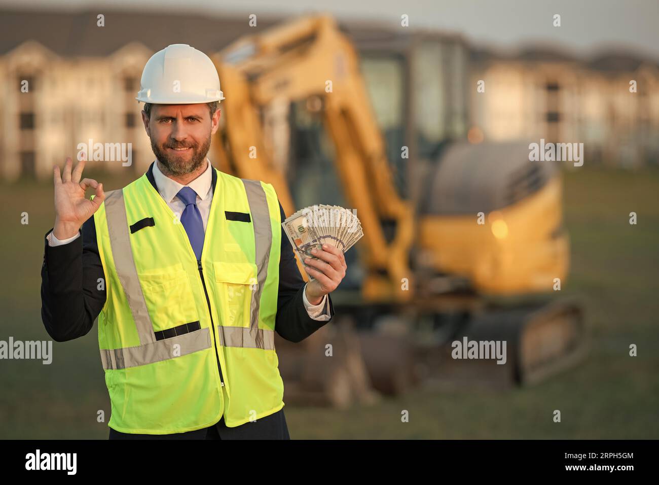 inspector man with money budget wearing helmet, ok. photo of inspector ...