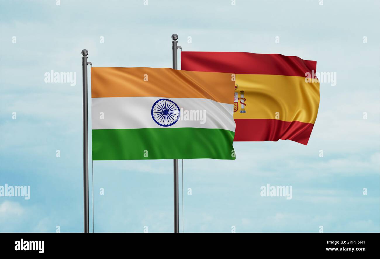 Spain and India flag waving together in the wind on blue sky, two ...