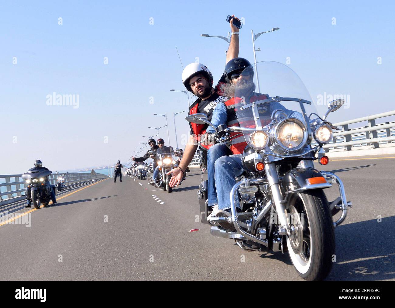 191101 -- KUWAIT CITY, Nov. 1, 2019 Xinhua -- Motorcyclists ride on the ...