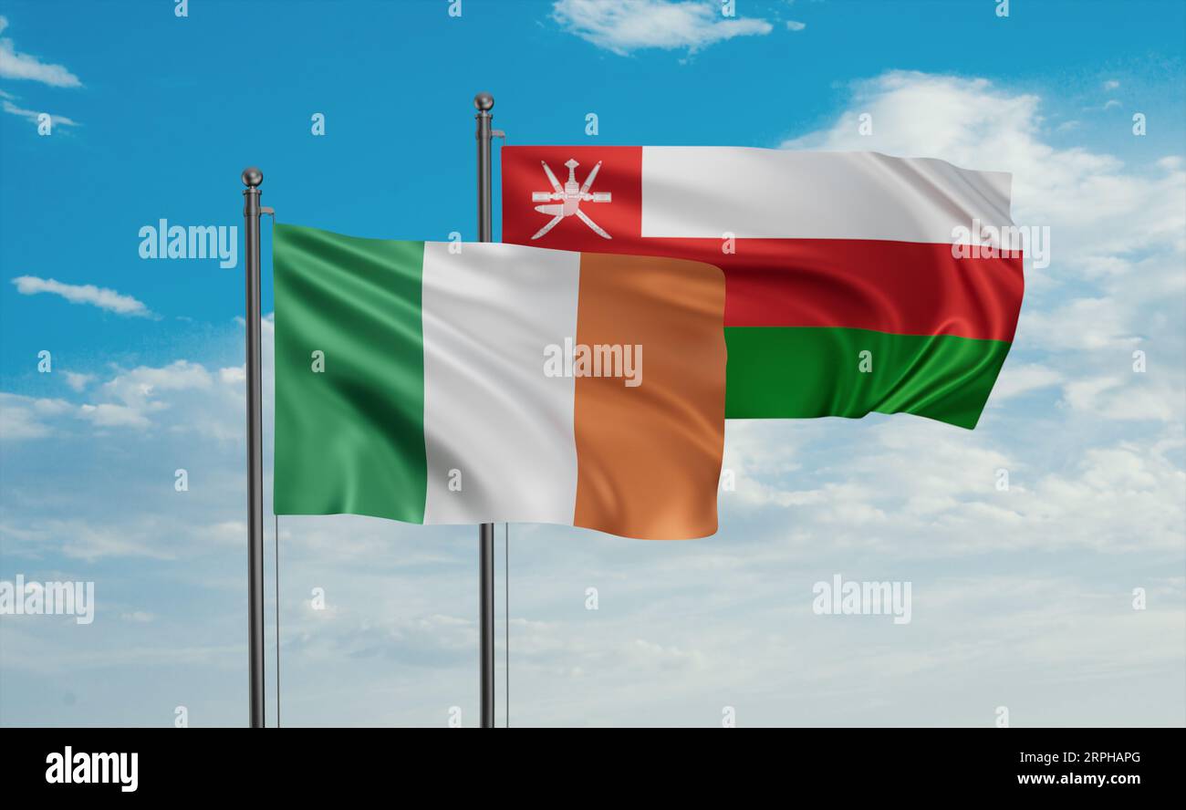 Oman and Ireland flag waving together in the wind on blue sky, two ...