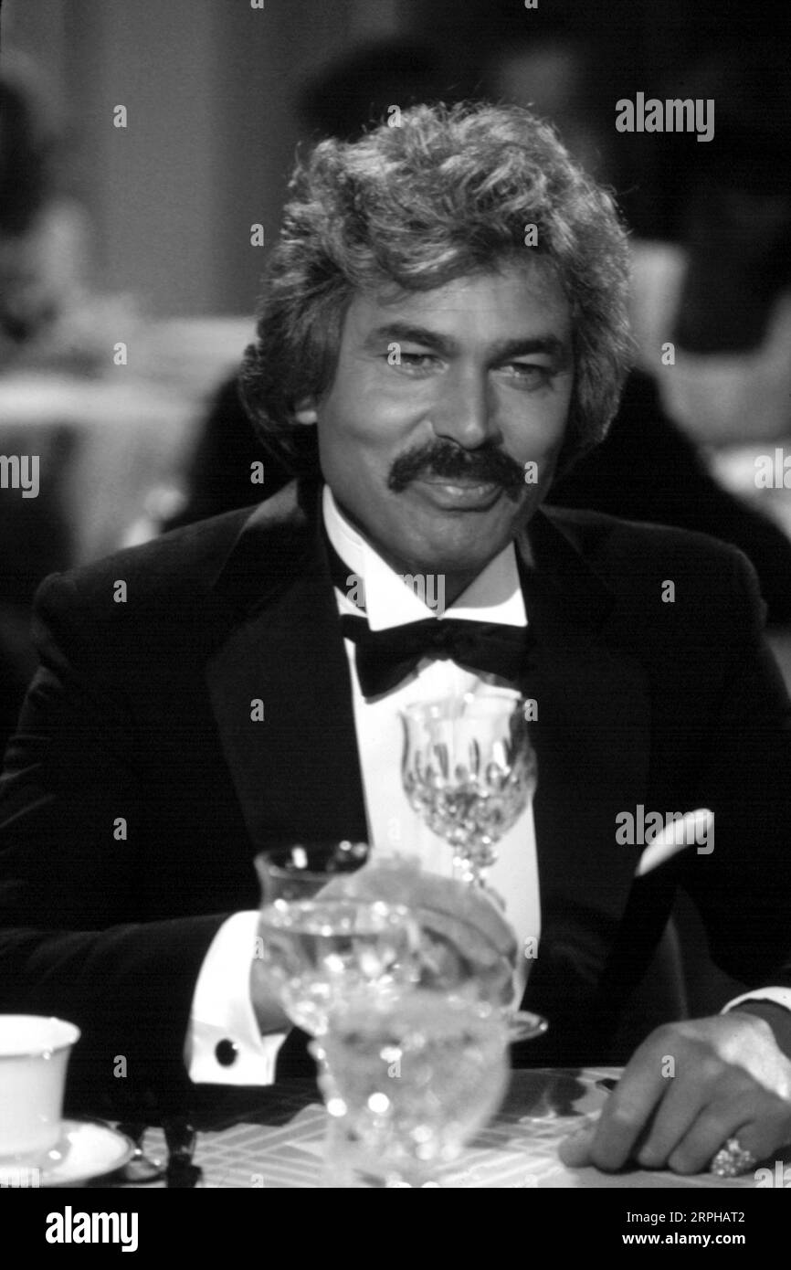 HOTEL TV Series JAMES BROLIN Connie Sellecca Stock Photo - Alamy