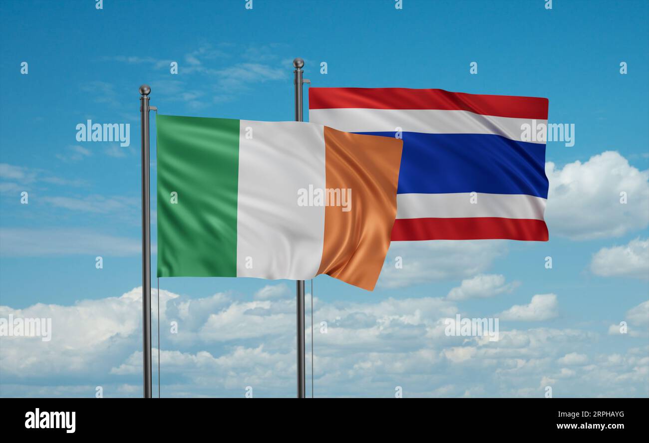 Kingdom of Thailand and Ireland flag waving together in the wind on ...
